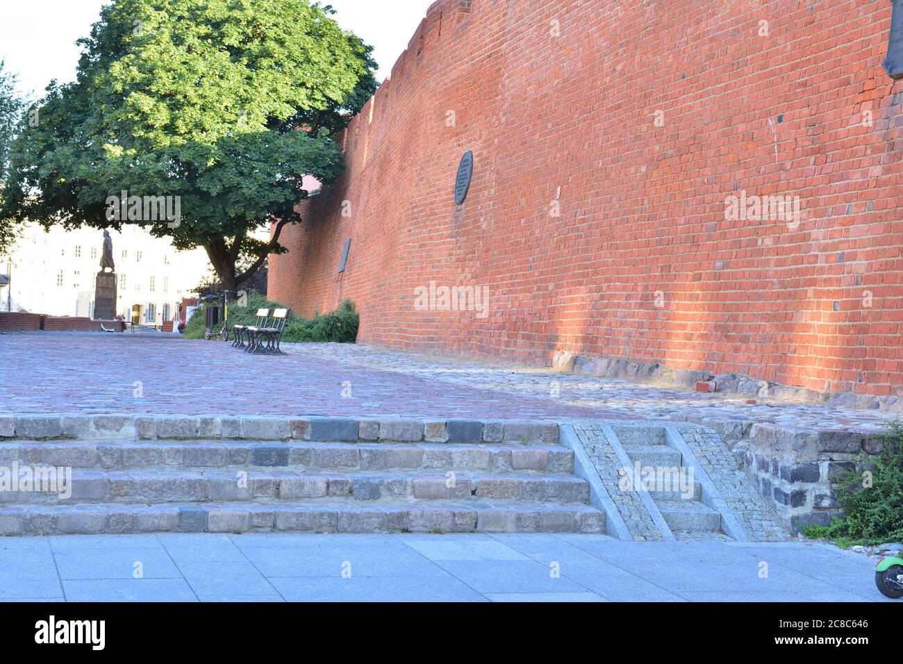 The historic defense walls of the Barbican in Warsaw's Old Town during ...
