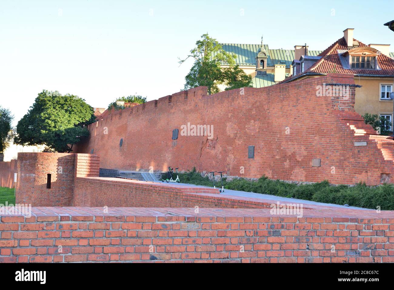 The historic defense walls of the Barbican in Warsaw's Old Town during ...