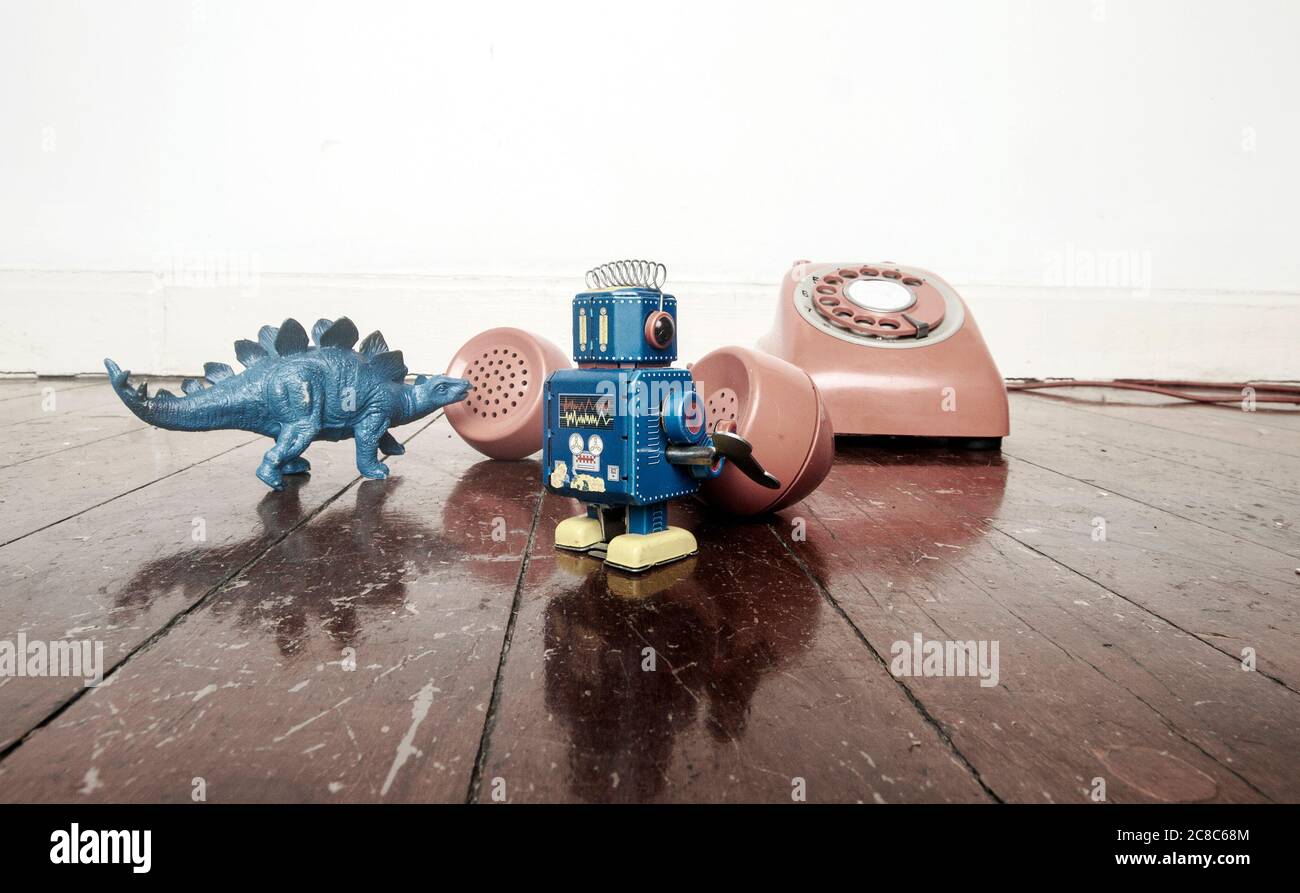 retro roys and old phone on a old wooden floor Stock Photo - Alamy