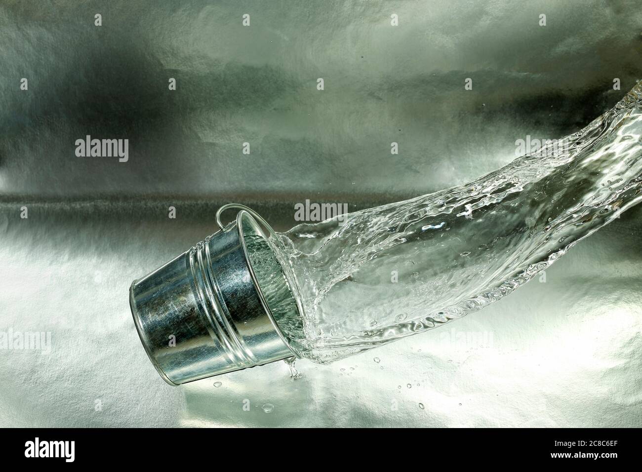 water coming out of bucket just before hitting the ground Stock Photo ...