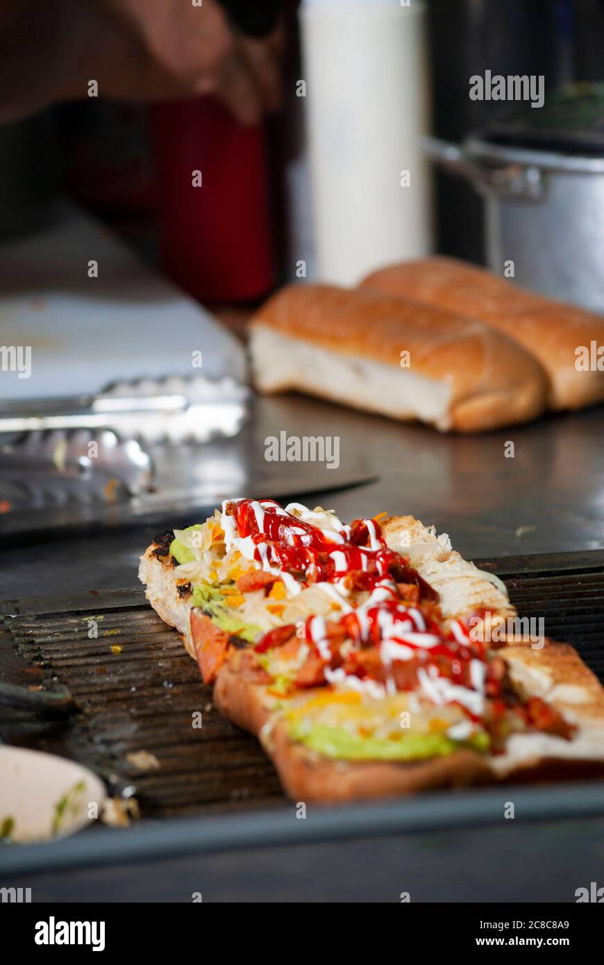 Fast food prepared on the street in Guatemala, Central America, bread ...