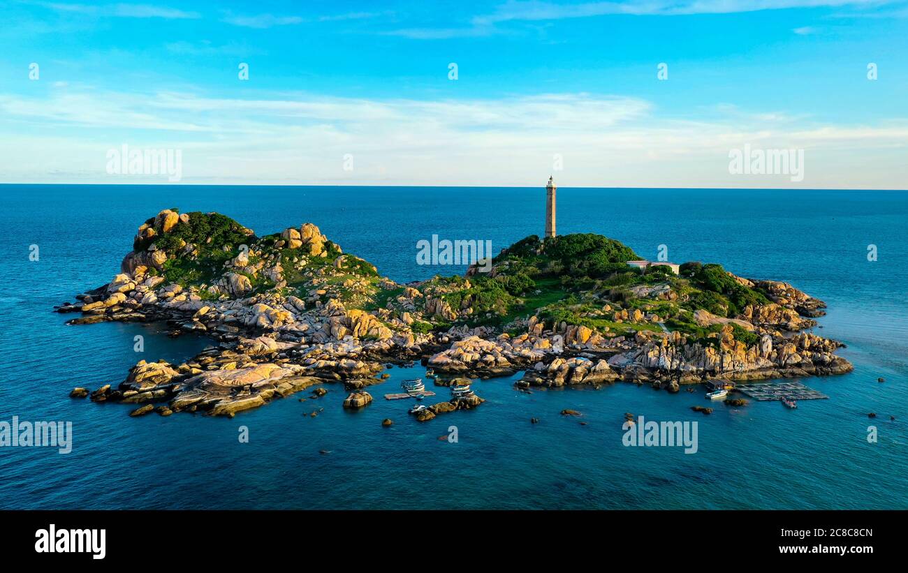Ke Ga lighthouse on island in Vietnam. Ocean view landscape. Drone ...