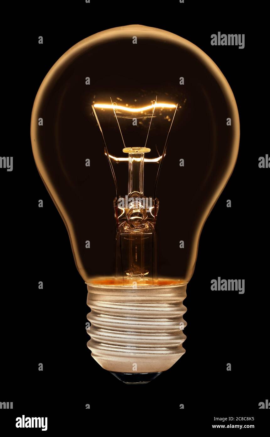 lit light bulb on black Stock Photo - Alamy