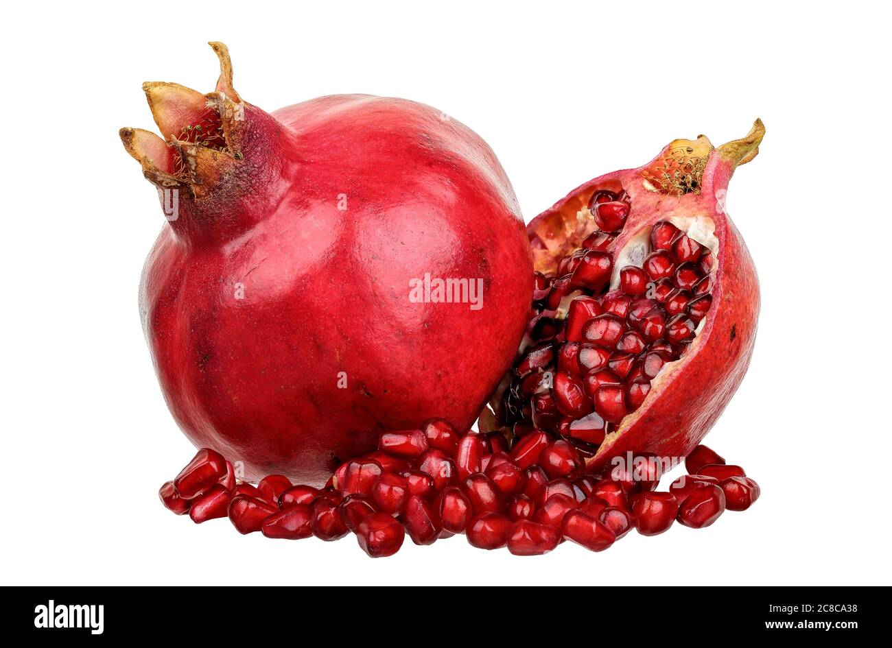 whole and half pomegranate isolated on white Stock Photo - Alamy