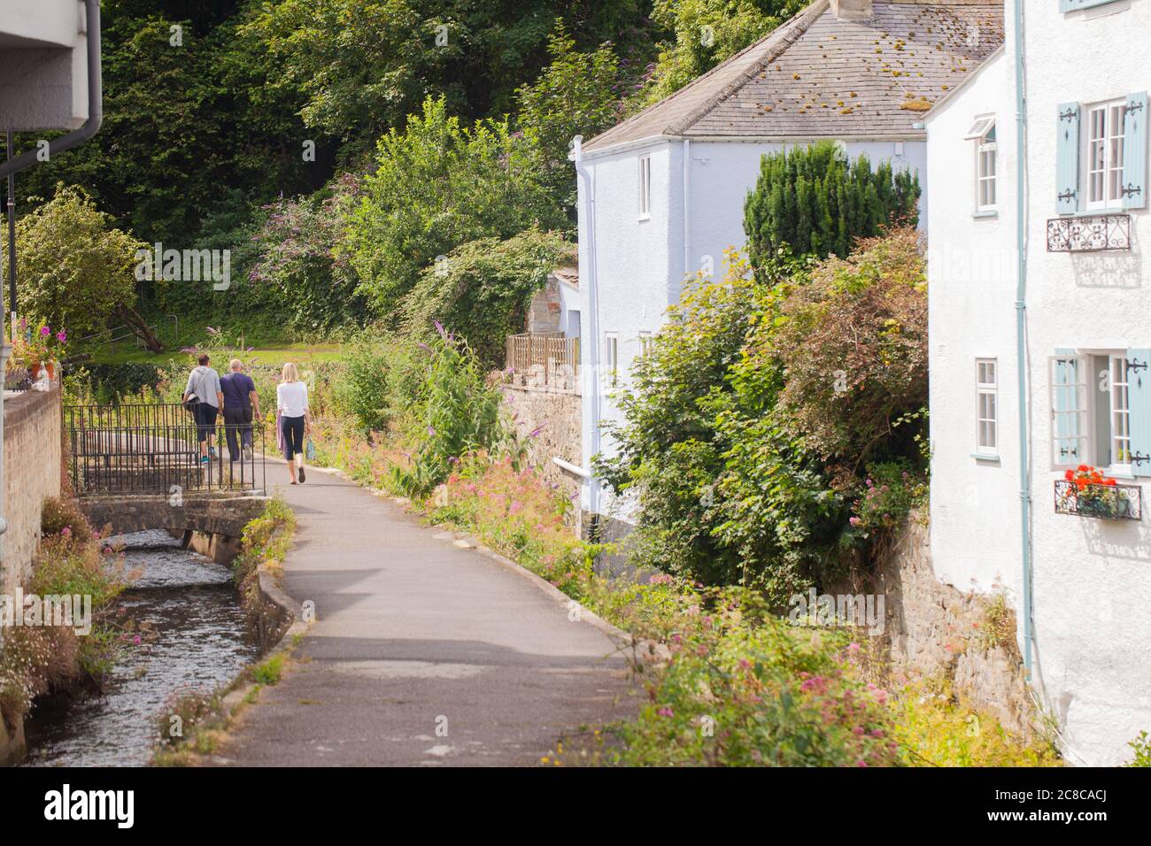 Travel / Healthy Lifestyle concept - People out on a walk by the River ...