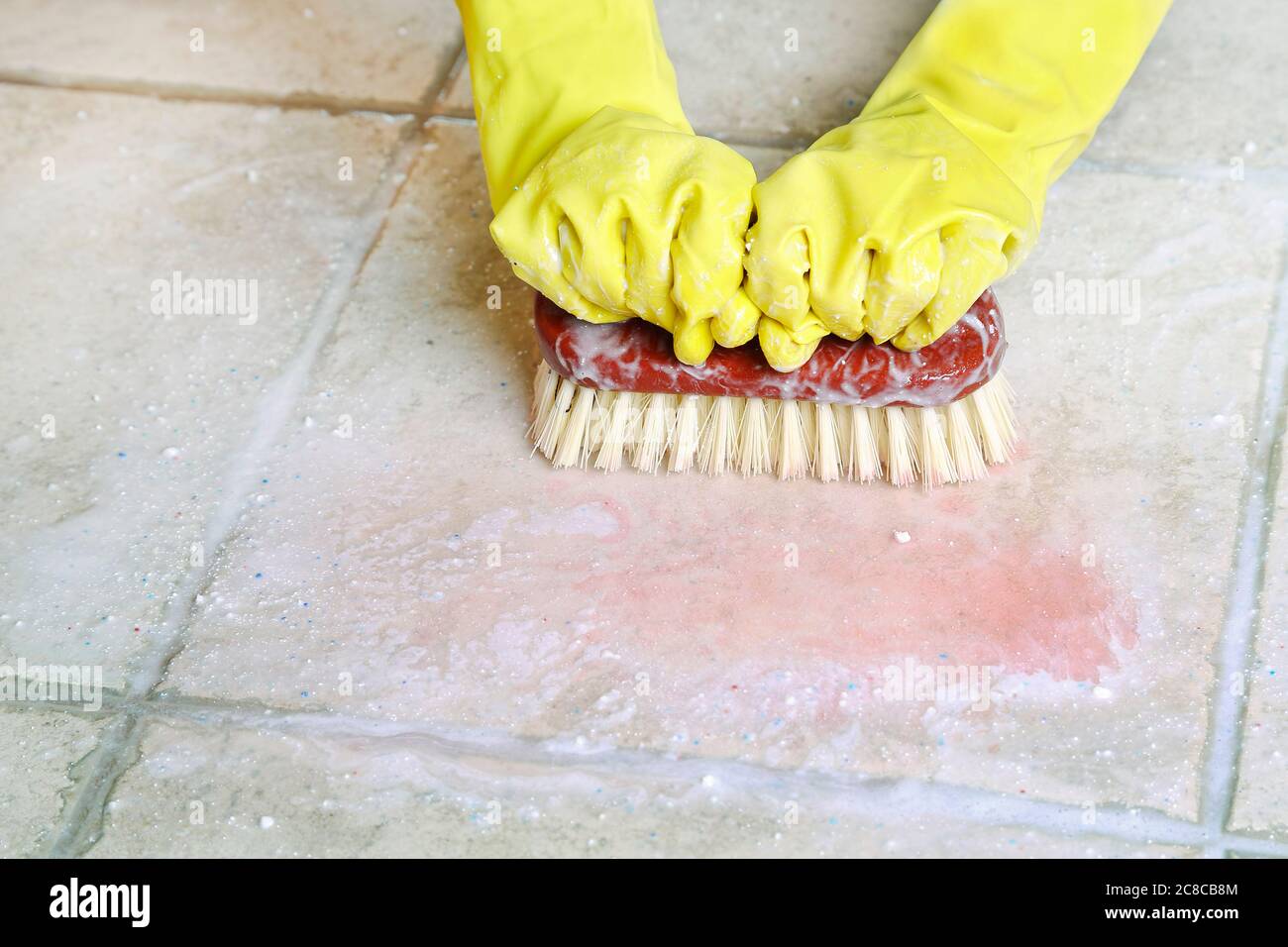 hands in rubber gloves scrubbing the floor Stock Photo - Alamy