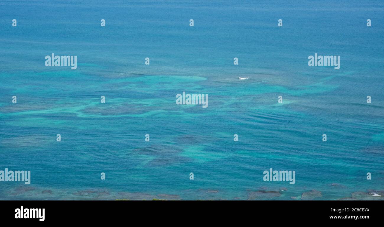 Full frame background of the Caribbean Sea waters with natural reef ...