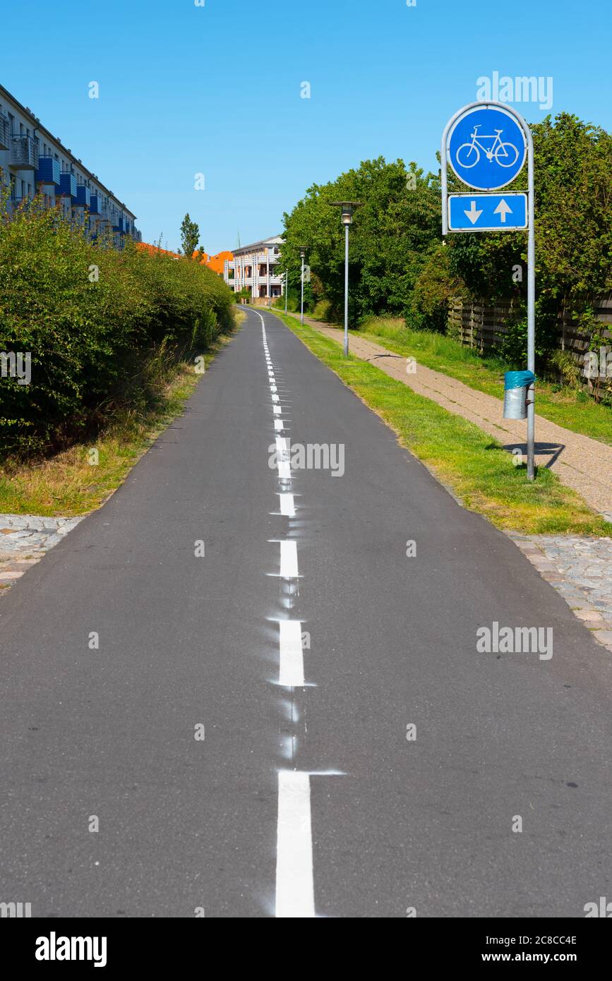 Dedicated two lane bike road through a residential area Stock Photo - Alamy