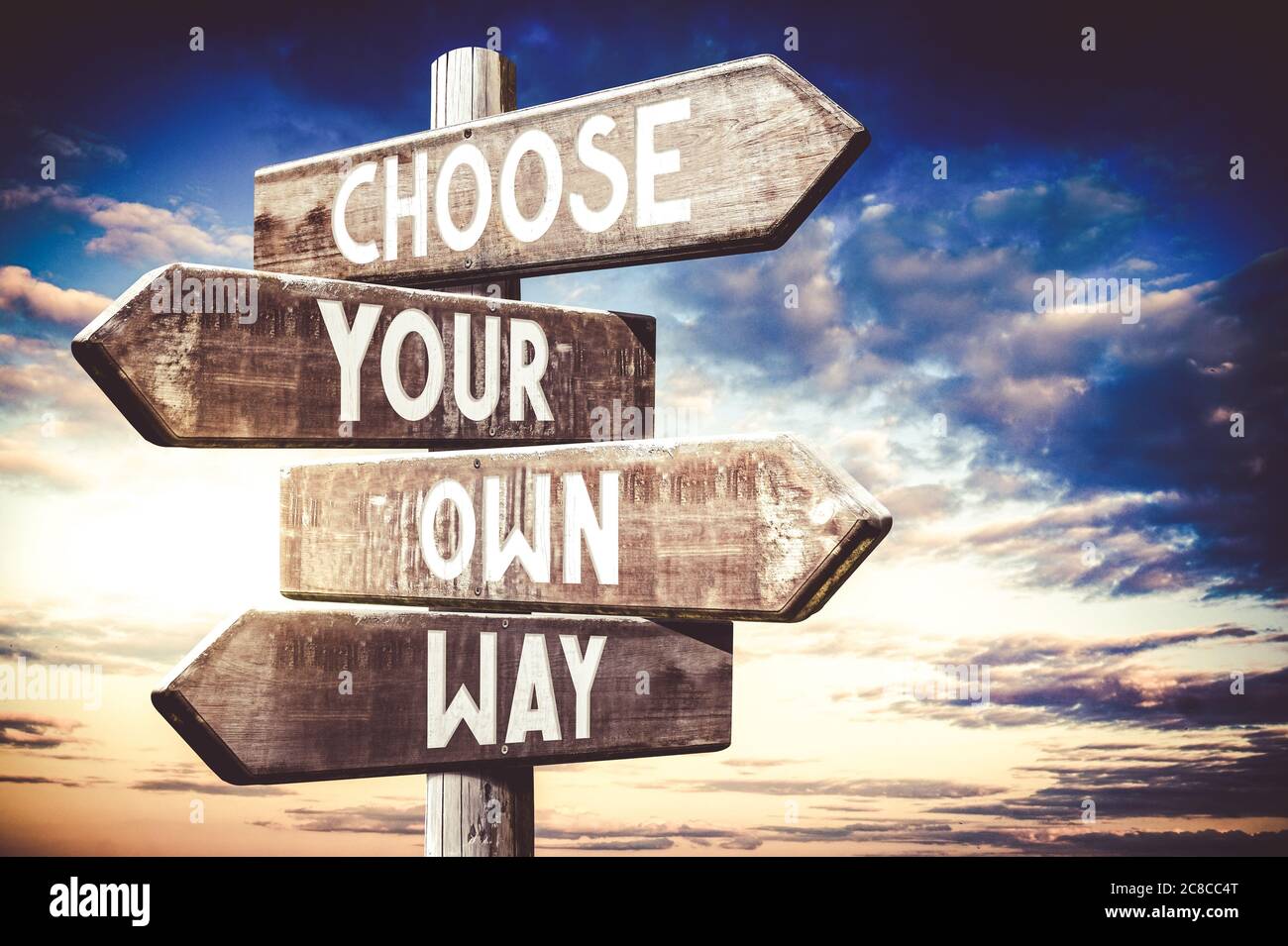 Choose your own way - wooden signpost, roadsign with four arrows Stock ...