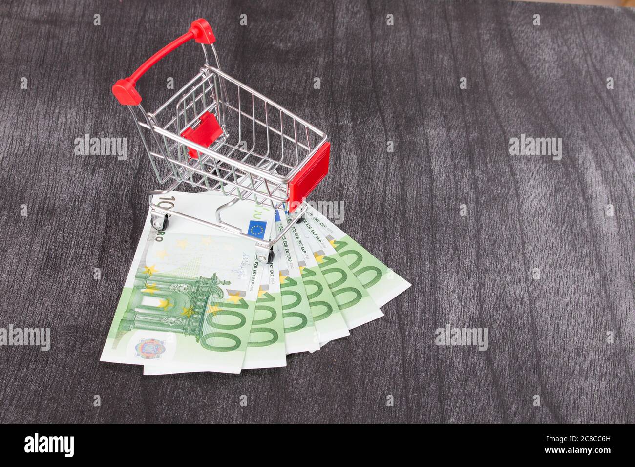 Shopping Cart Full of Cash. Shopping consept, euro money in cart ...