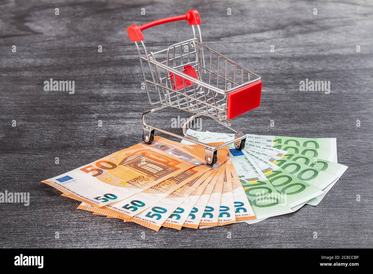 Shopping Cart Full of Cash. Shopping consept, euro money in cart ...