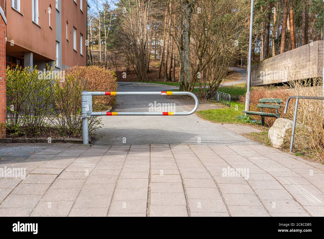 Movable metal road barrier on a walkway Stock Photo - Alamy