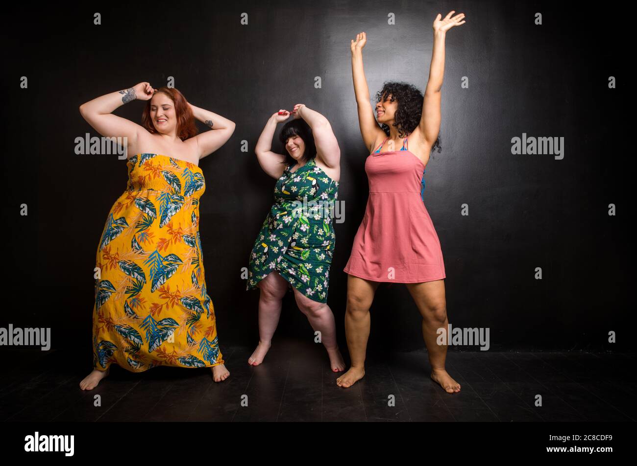 Group of 3 oversize women posing in studio - Beautiful girls accepting ...