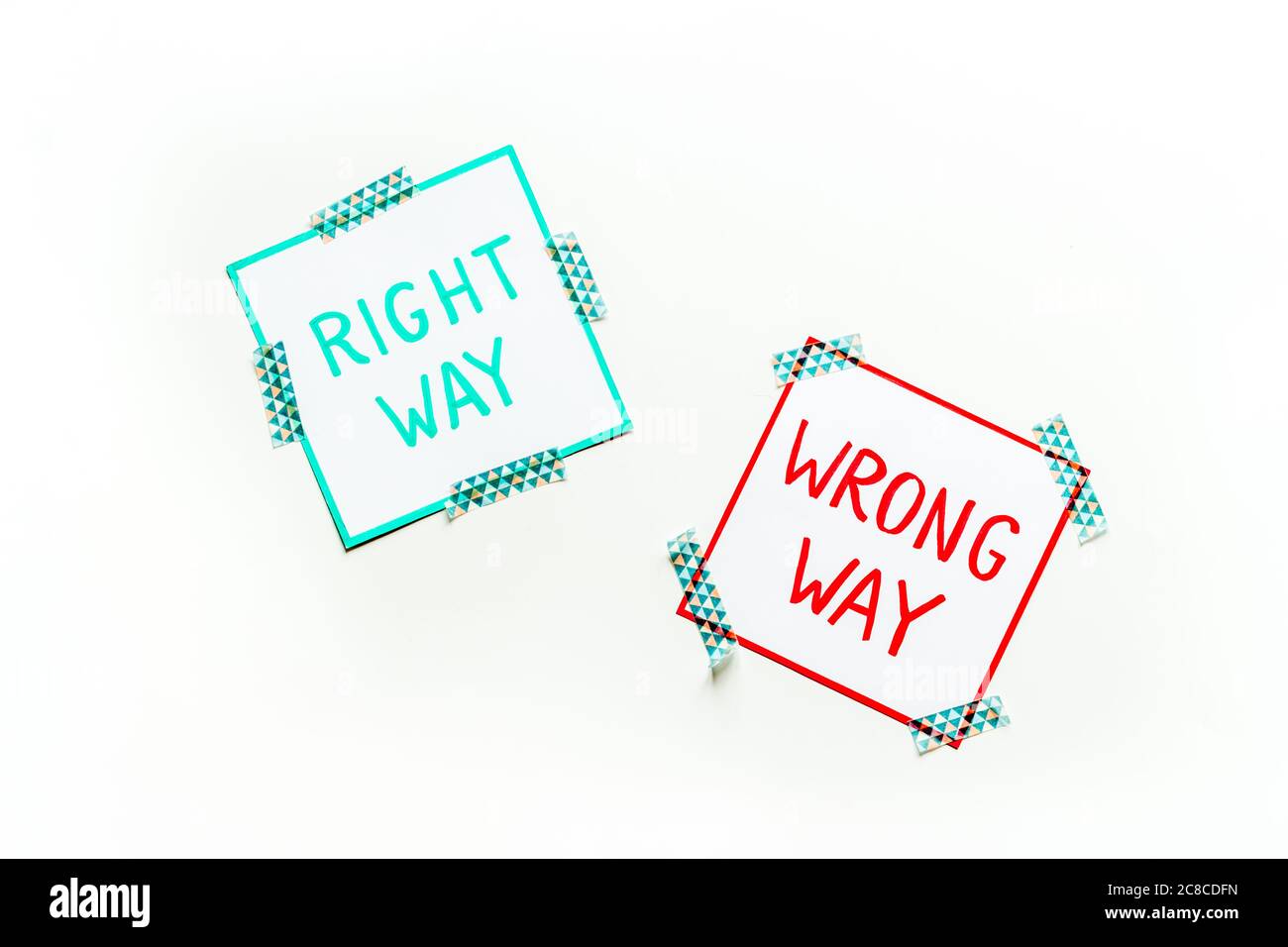 Problem solving. Right and wrong way icons on work desk from above ...