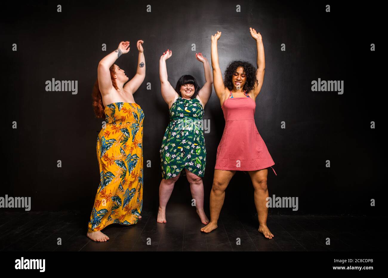 Group of 3 oversize women posing in studio - Beautiful girls accepting ...