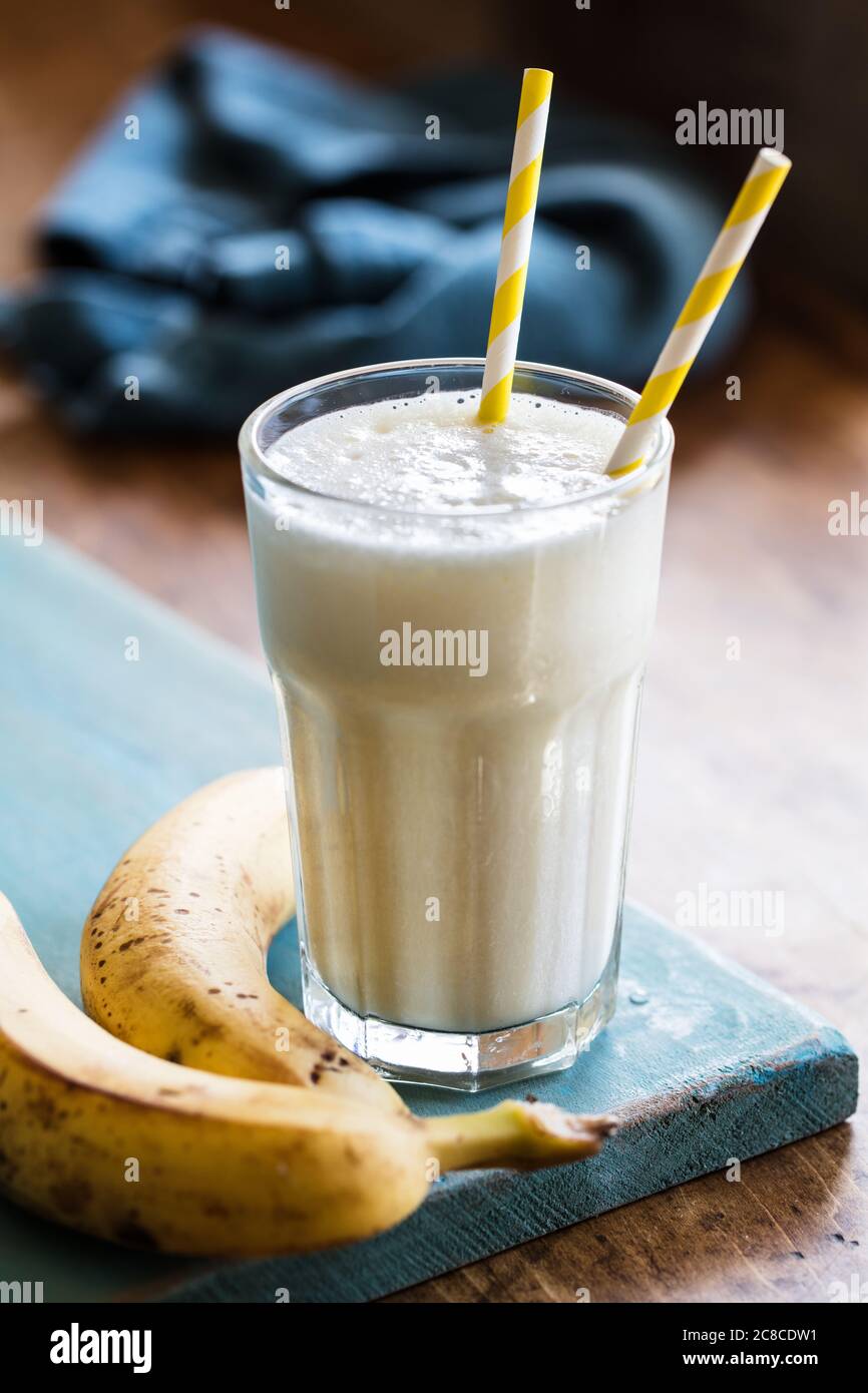 Paper banana on blue hi-res stock photography and images - Alamy