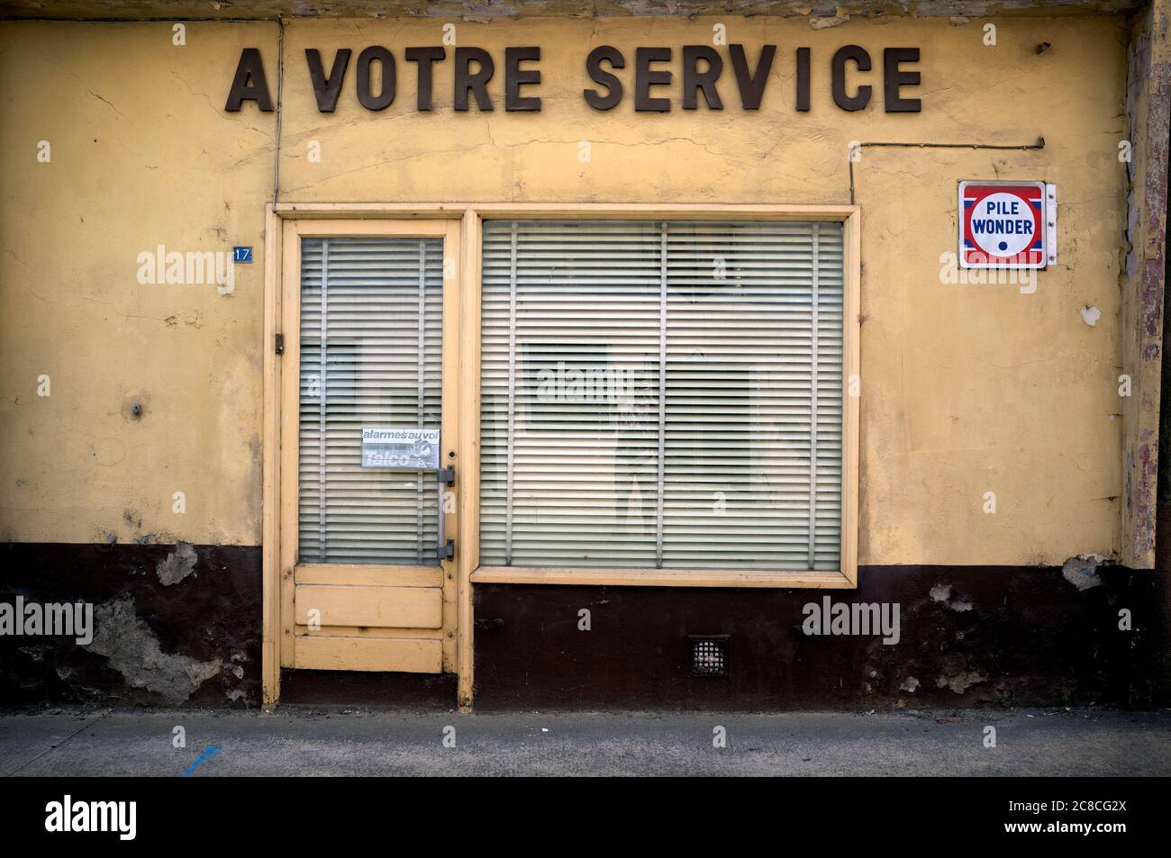 An old shop front in the French village of Cessenon-sur-Orb Stock Photo ...