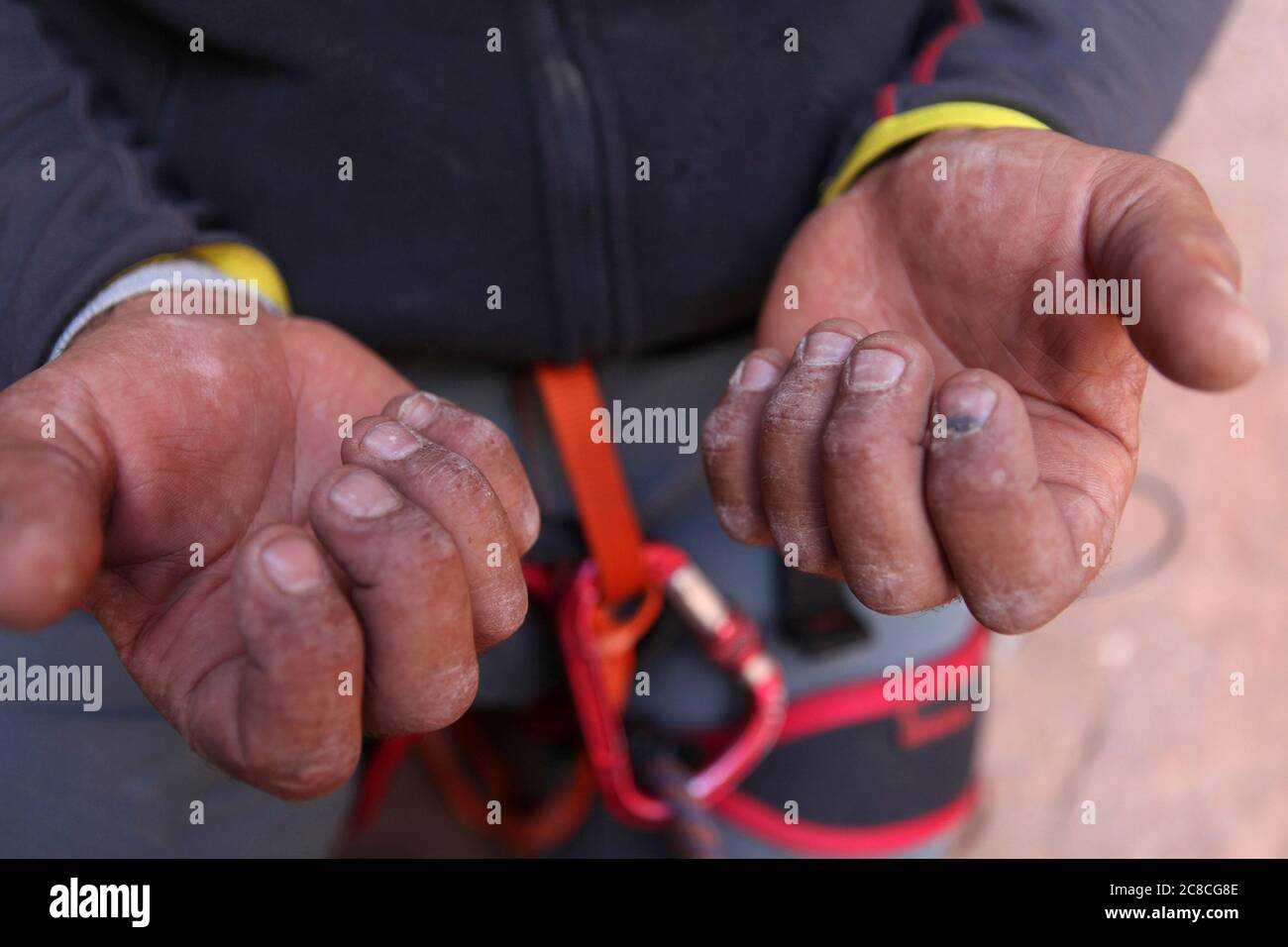 The rough and Callus hands of a rock climber. Photographed in Wadi Rum ...