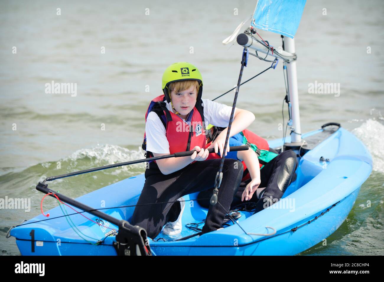 Kids sailing in the Solent. Children learning to sail Quba dinghies in ...