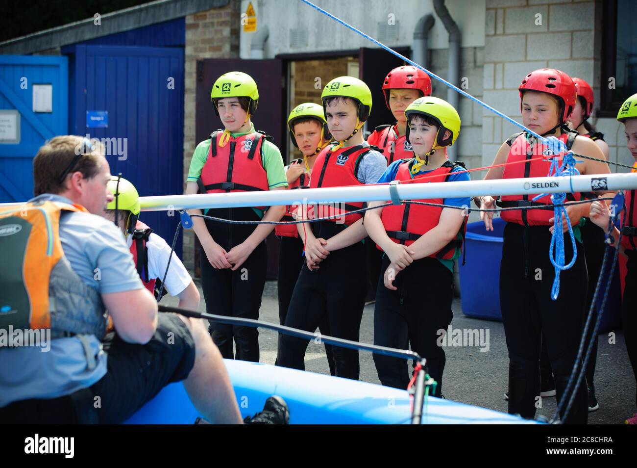 Kids sailing in the Solent. Children learning to sail Quba dinghies in ...
