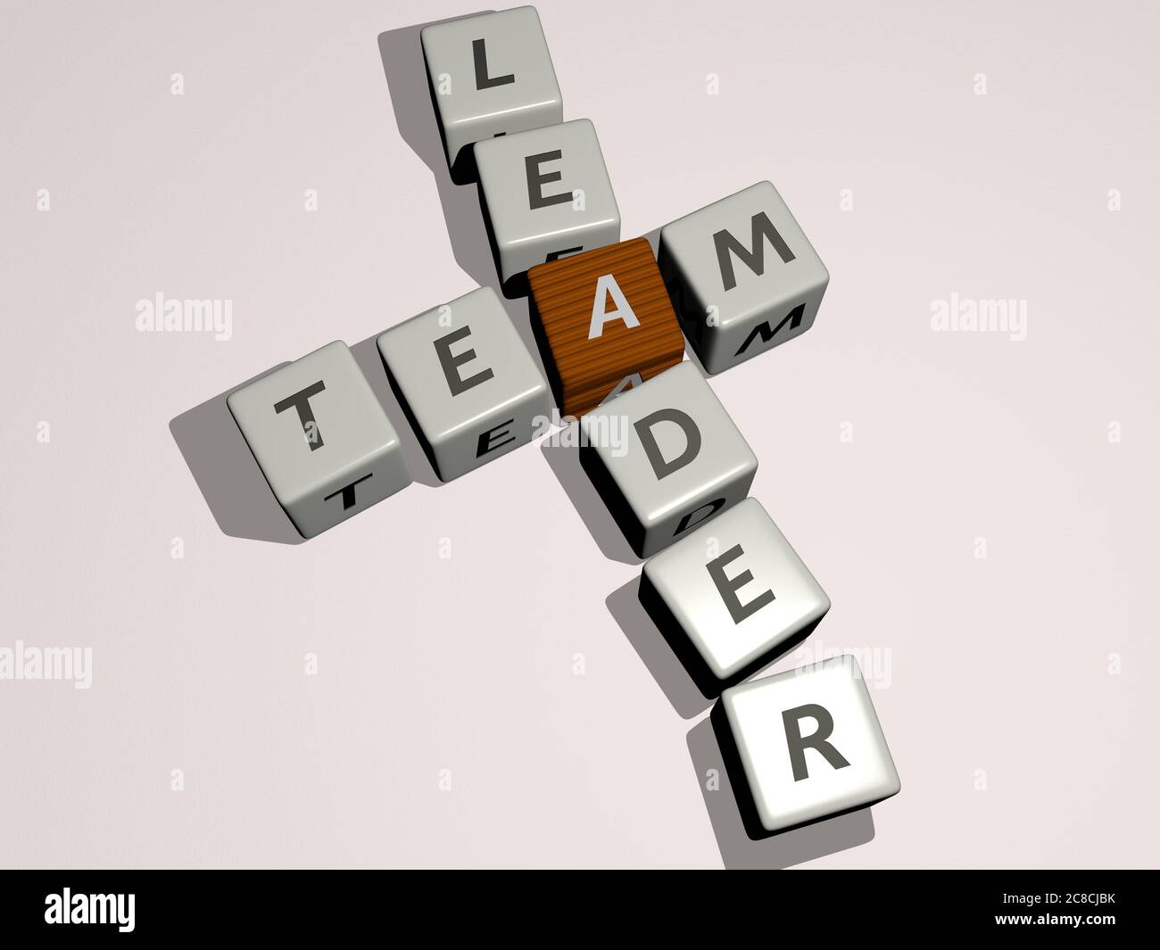 crosswords of TEAM LEADER arranged by cubic letters on a mirror floor ...