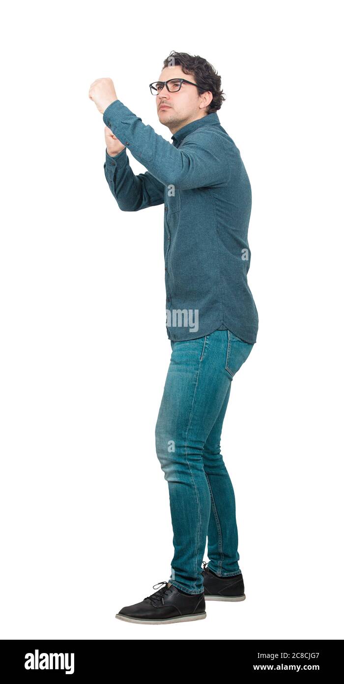 Full length of confident and frustrated businessman ready for struggle ...