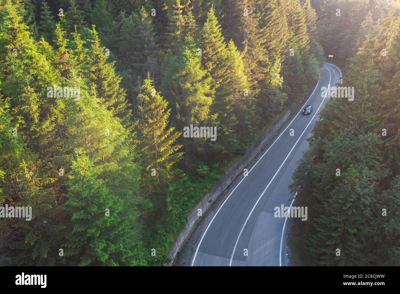 Aerial landscape of mountain winding road, in Transylvania Stock Photo ...