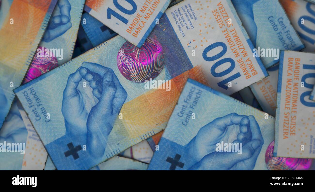 A close-up view of a scattered pile of swiss franc banknotes - 3D ...