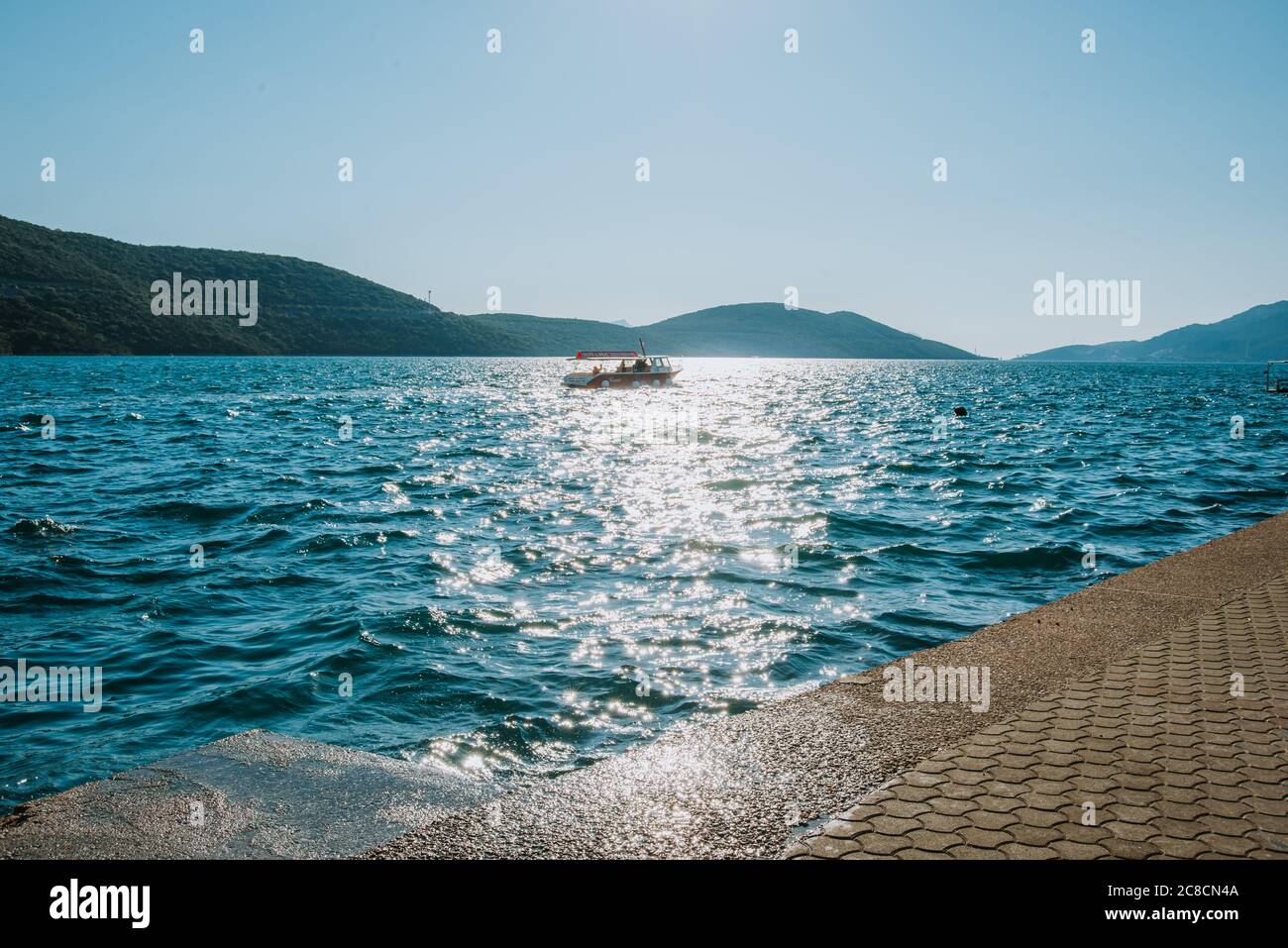 Sailing boat in the distance hi-res stock photography and images - Alamy