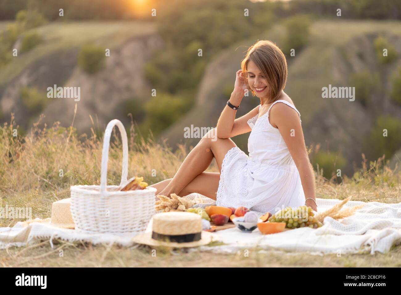 A romantic date with a beautiful girl. An evening picnic in a ...