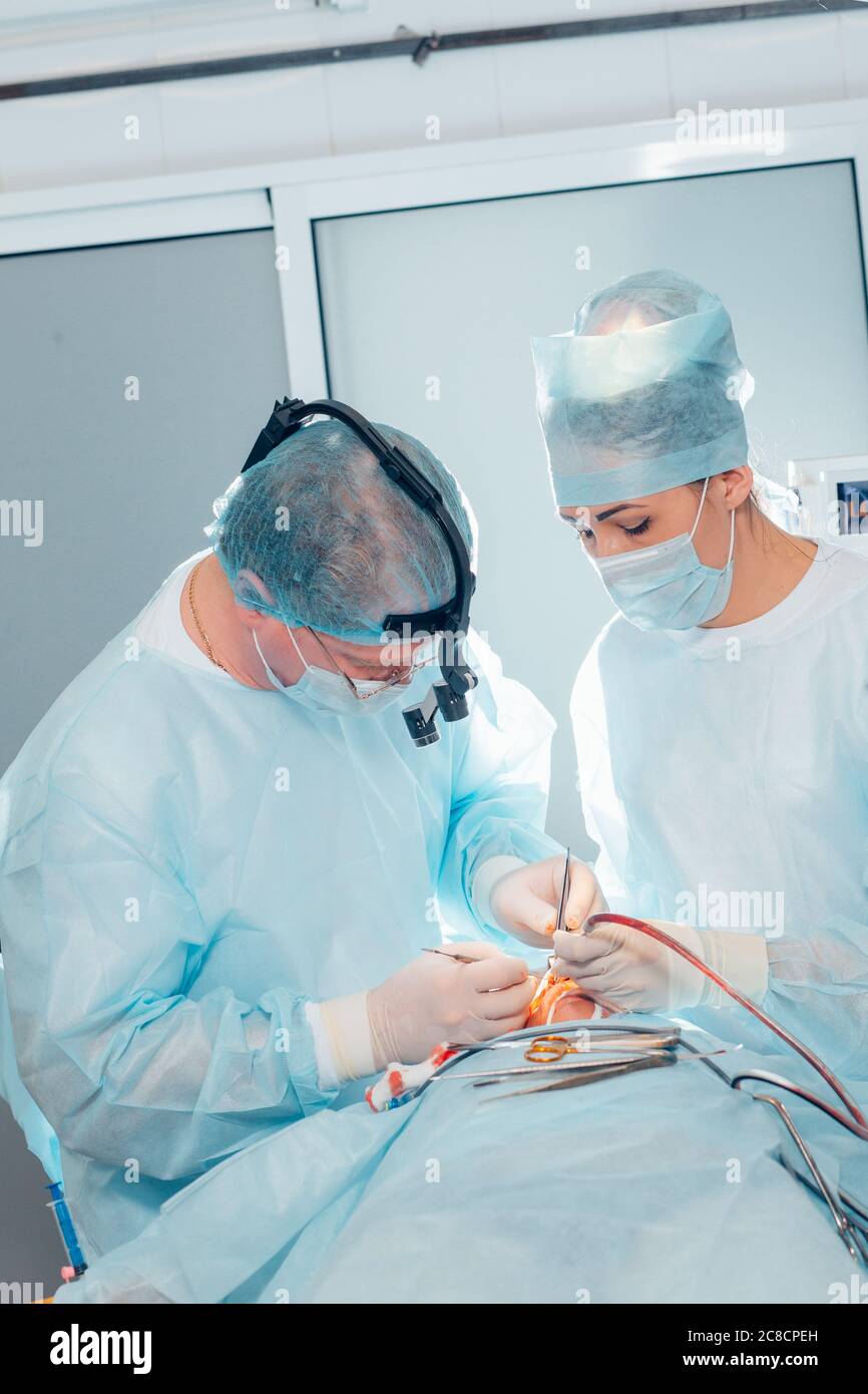 Surgeon assistant doing plastic hi-res stock photography and images - Alamy