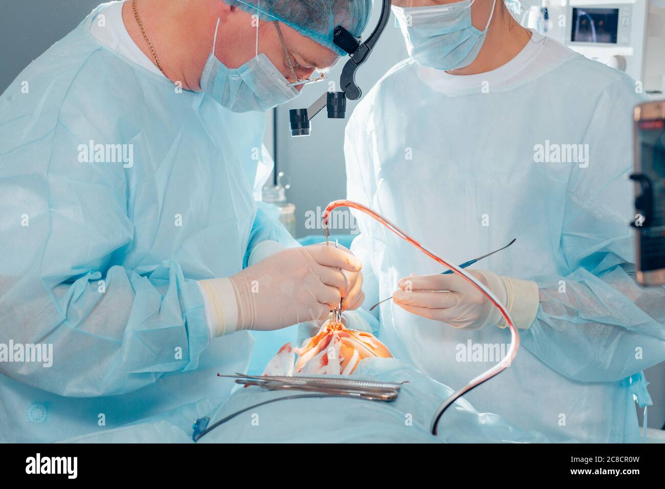 surgery, healthcare, medicine and people concept - group of surgeons at ...