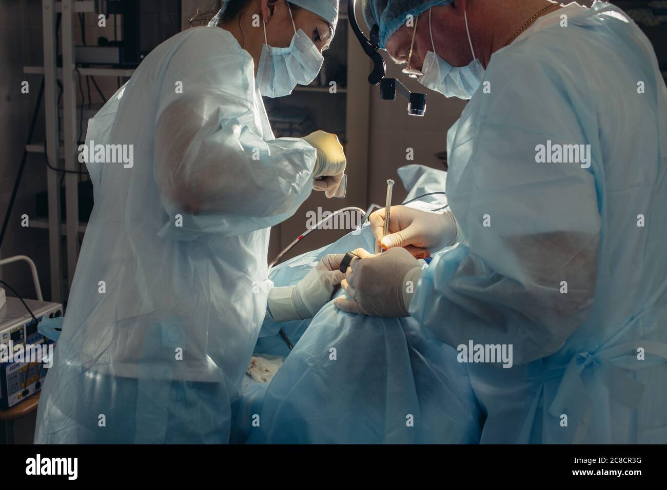 surgery, healthcare, medicine and people concept - group of surgeons at ...