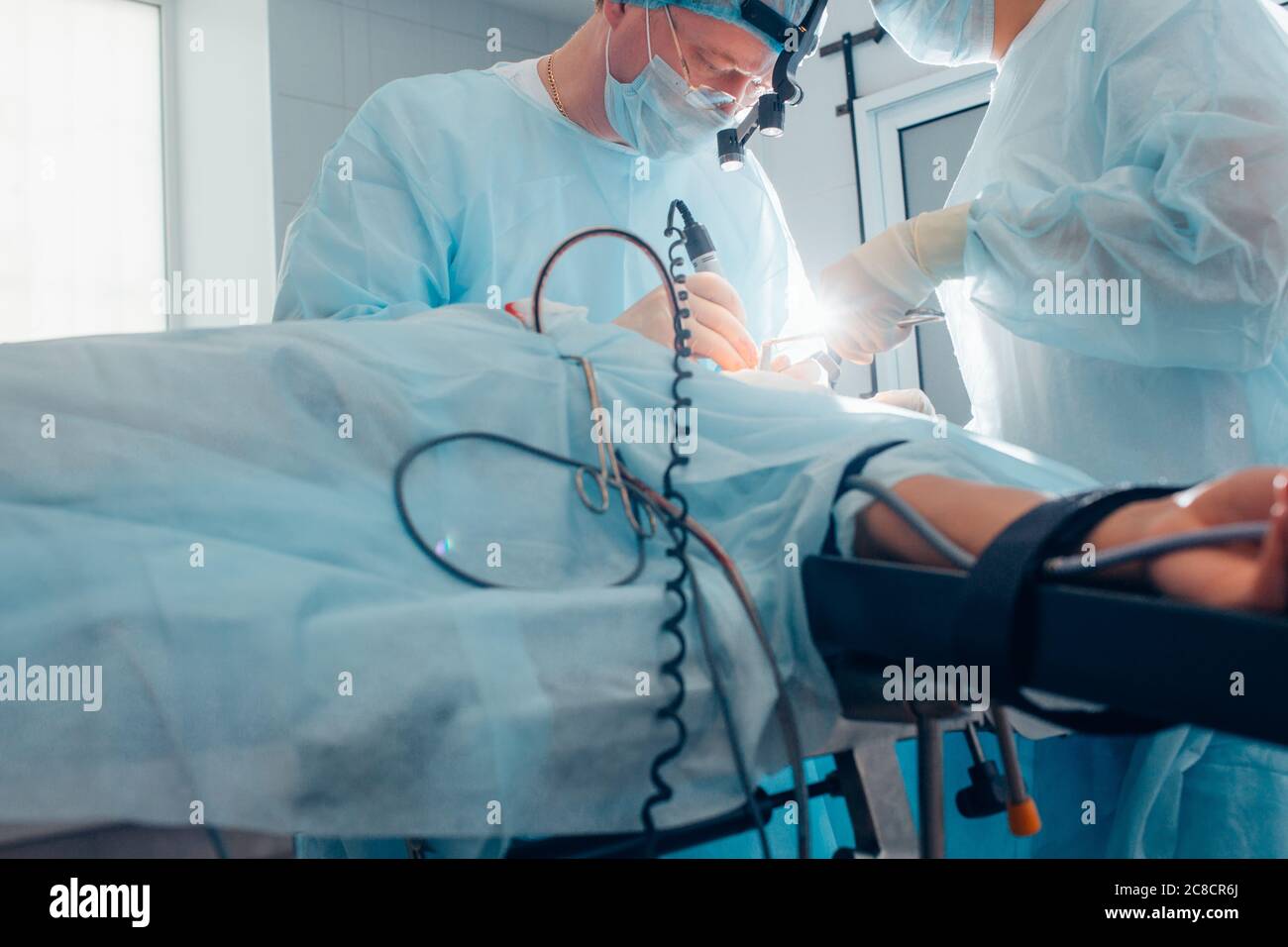 Patient Lying On An Operation Table High Resolution Stock Photography ...