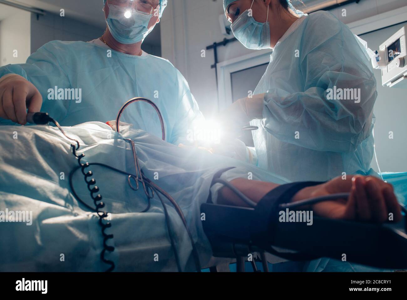 patient lies on the operating surgical table during rhinoplastic ...