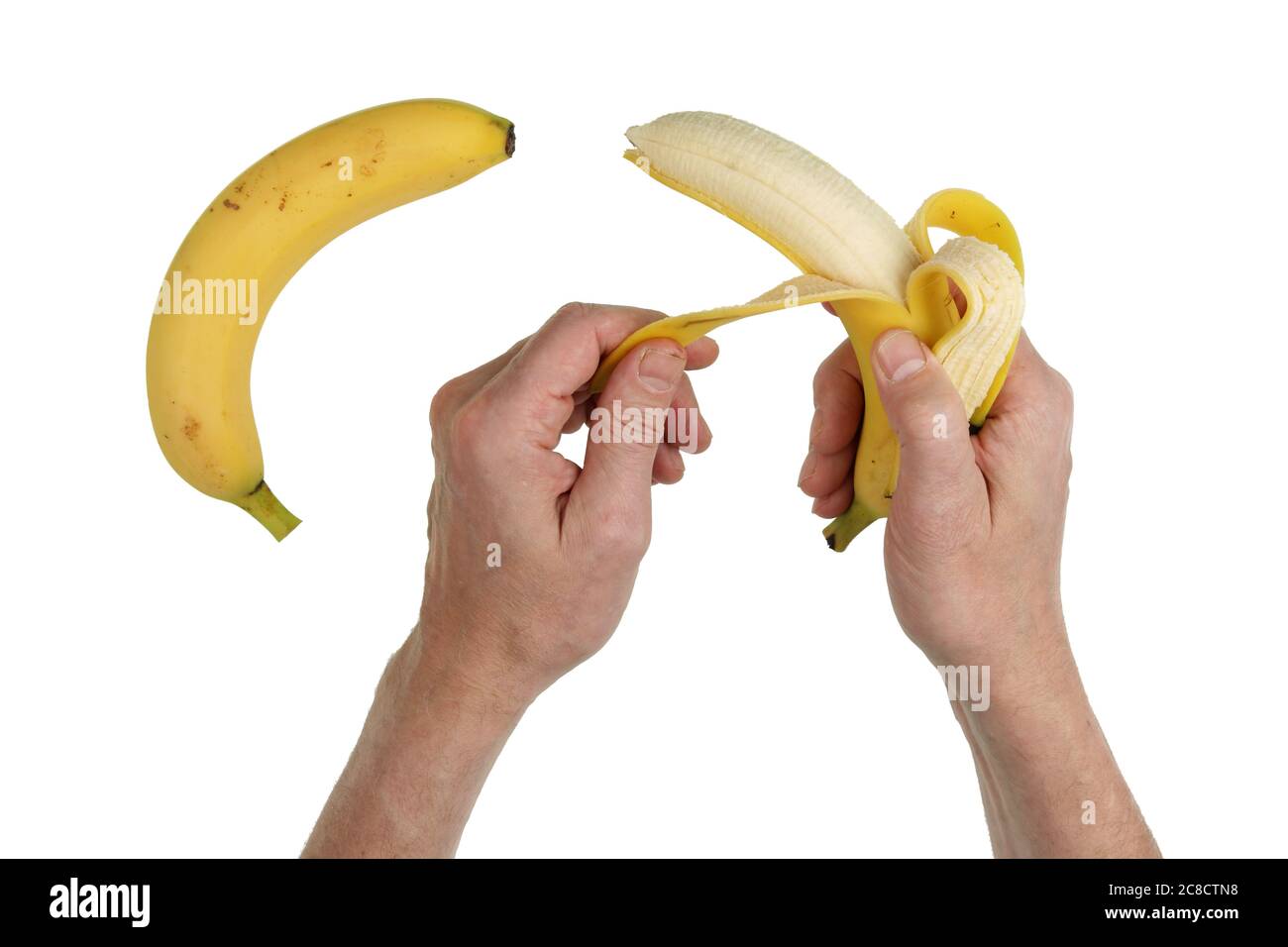The old man with his own hands is cleaning the banana fruits from the ...