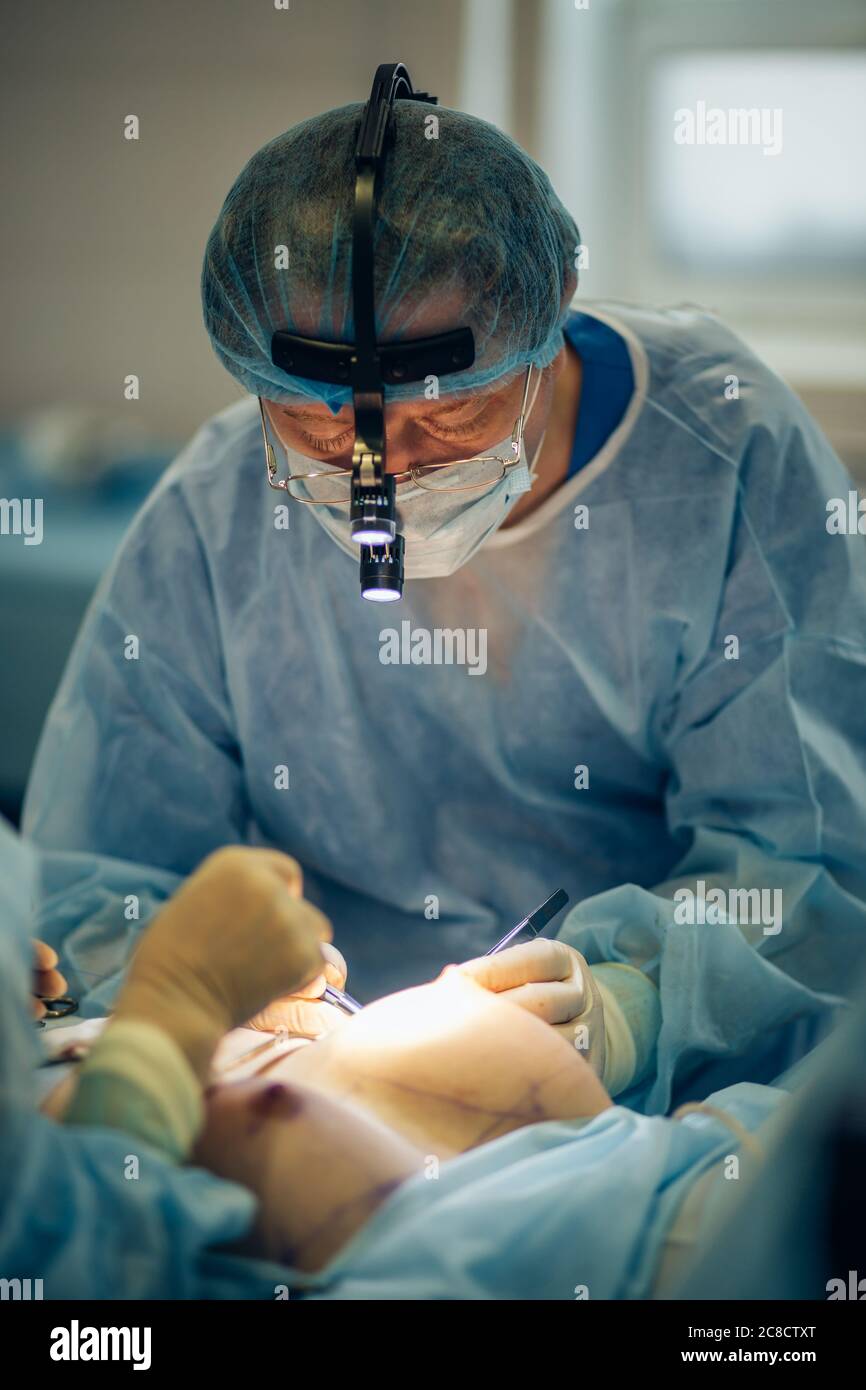 Stitching the patient's skin, the self-extracting threads, after ...