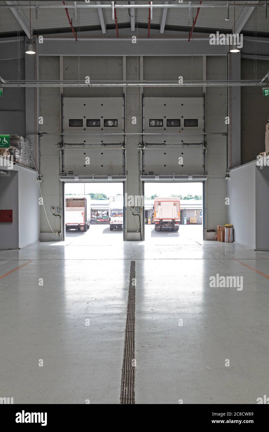 Loading Cargo Doors in Distribution Warehouse Stock Photo - Alamy