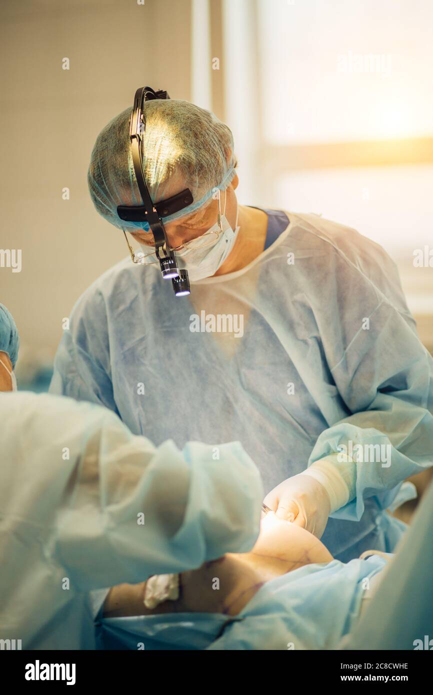 Stitching the patient's skin, the self-extracting threads, after ...