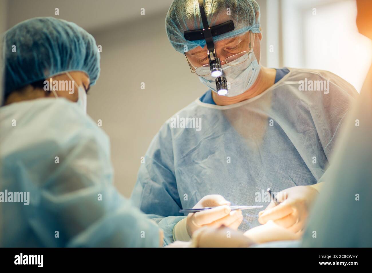 Stitching the patient's skin, the self-extracting threads, after ...