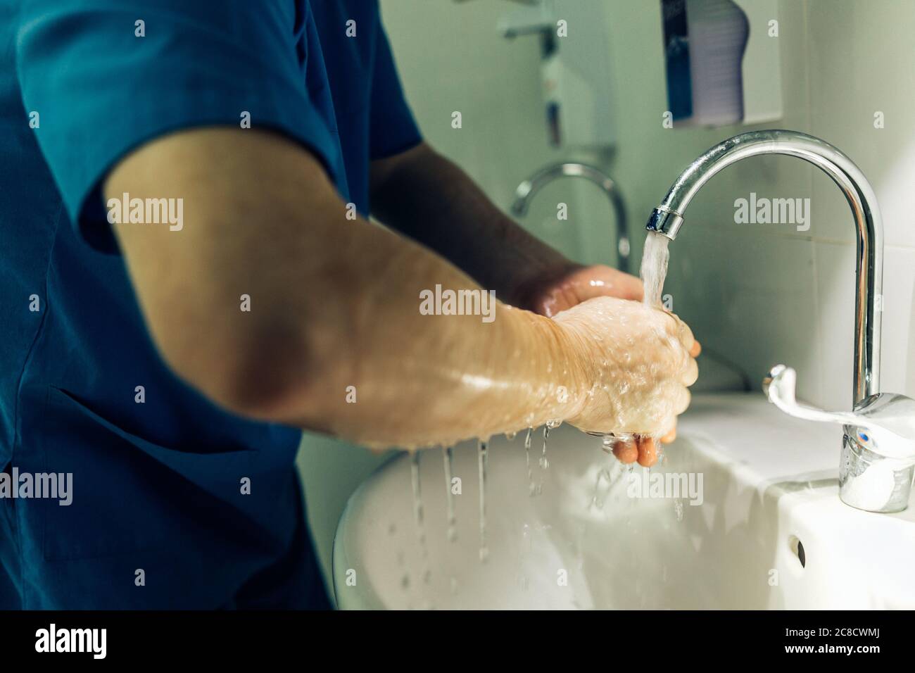Close Up Of Medical Staff Washing Hands Stock Photo - Alamy