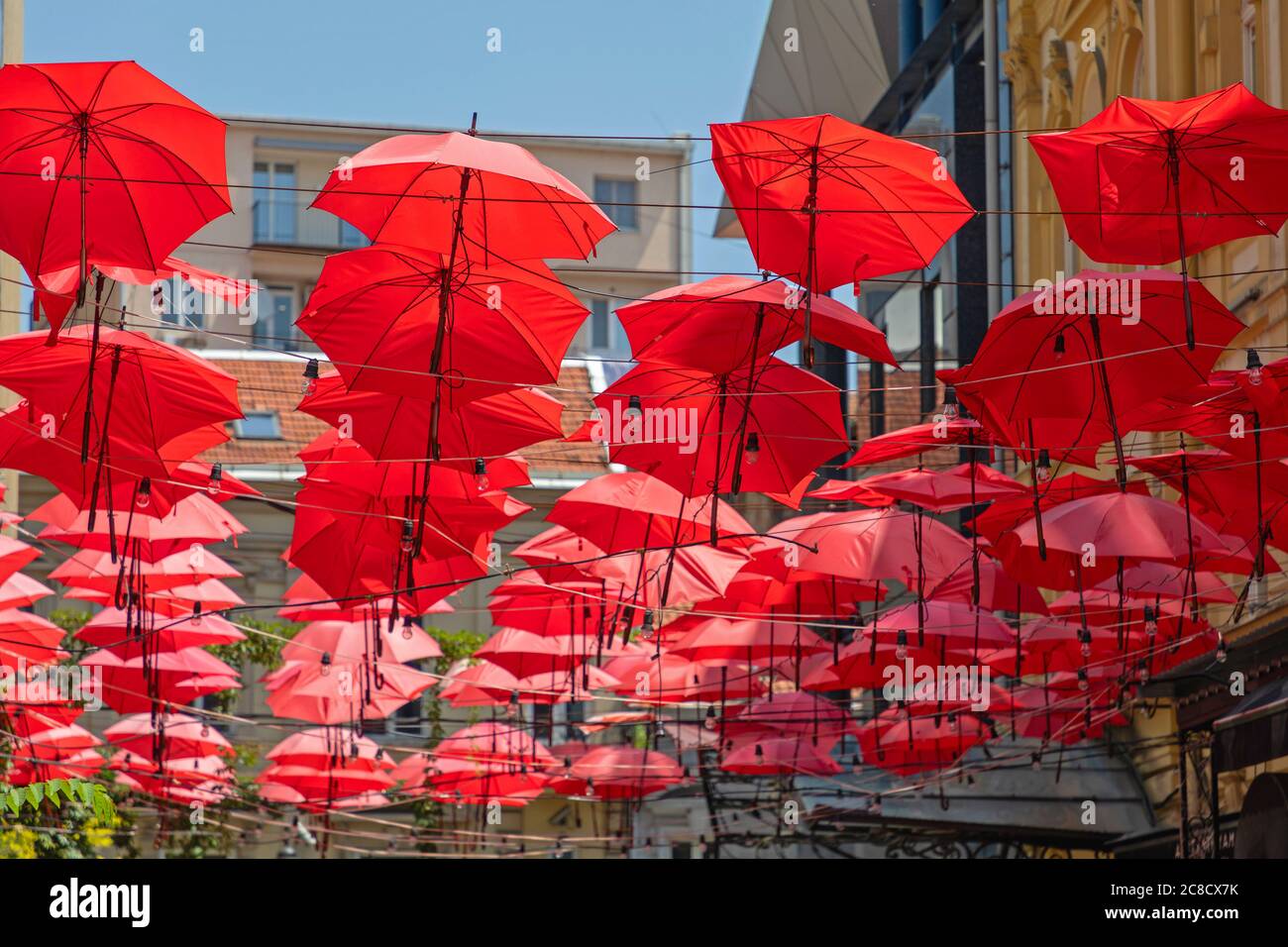 Many Red Umbrellas Hanging City Street Decoration Stock Photo - Alamy