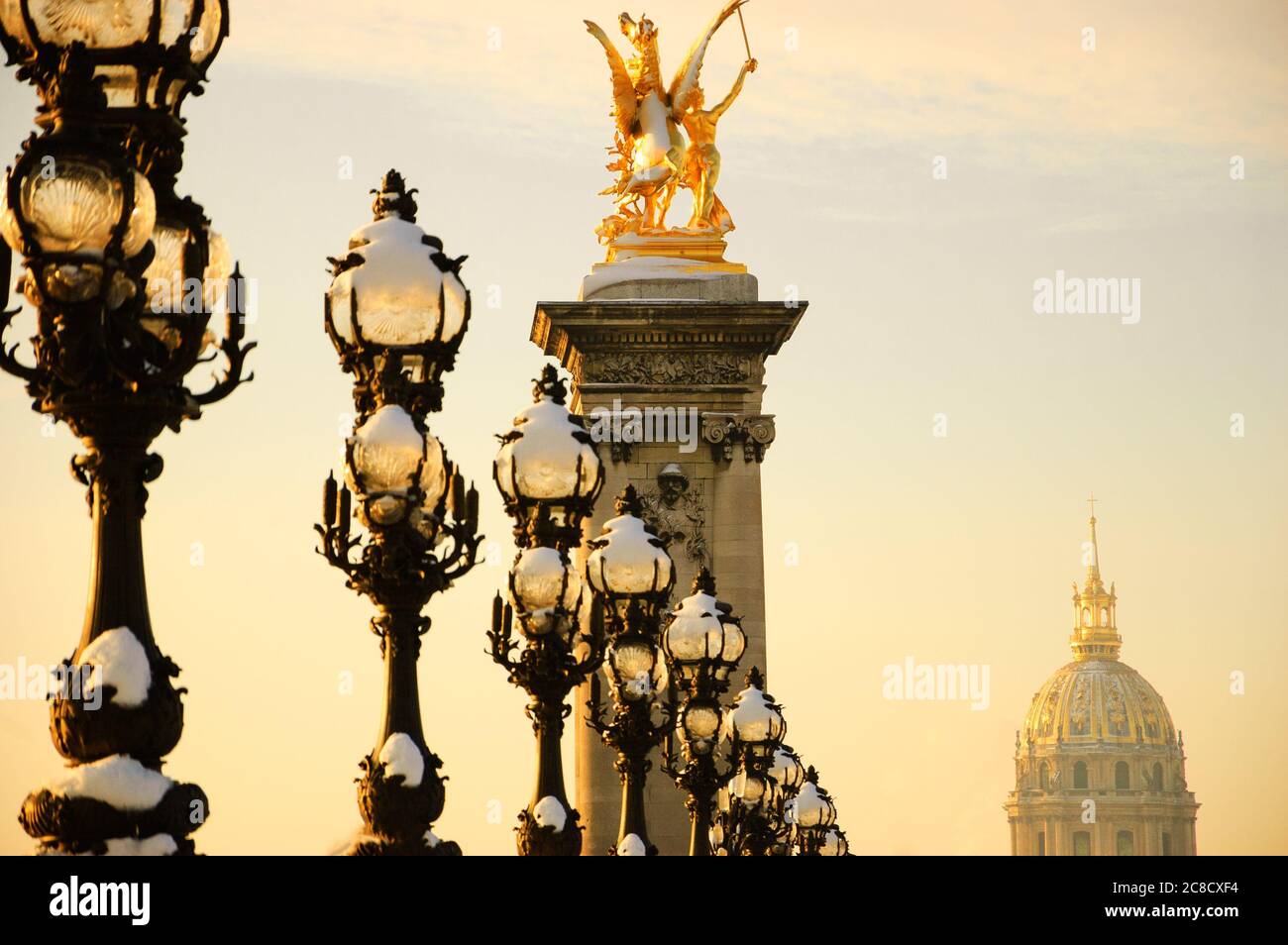 Paris under snow. View from Alexandre III Bridge of Hotel national des ...