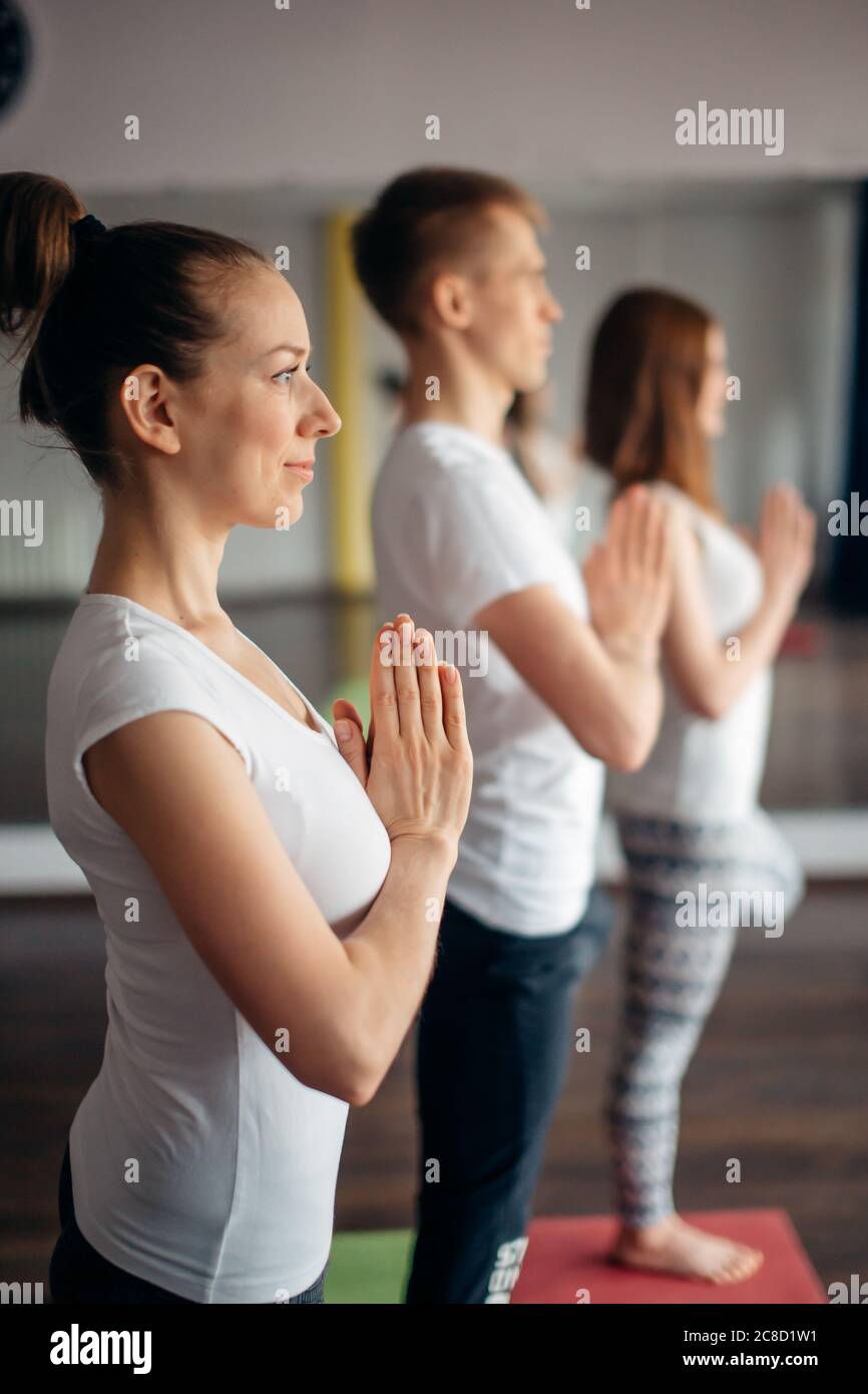 Yoga Class, Group of People Relaxing and Doing Yoga. Child's Pose ...