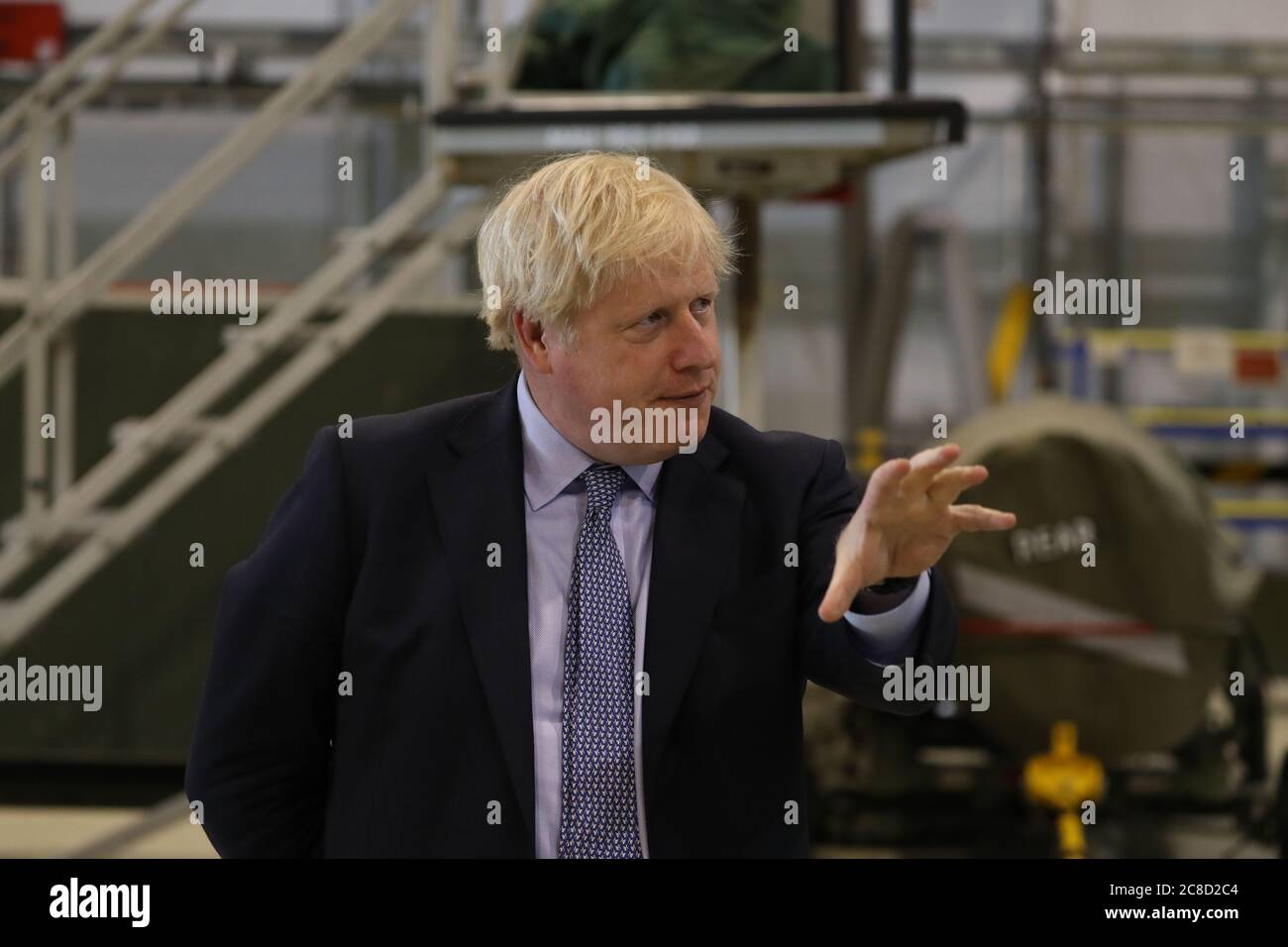 Prime Minister Boris Johnson looks at a Typhoon fighter jet at RAF ...