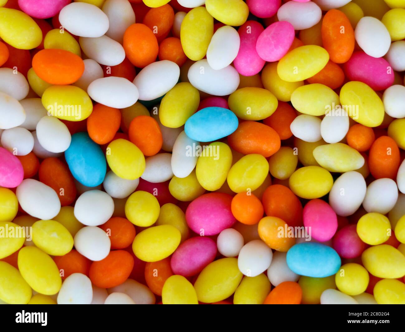 Multi colored fennel sugar candy as texture/background Stock Photo - Alamy
