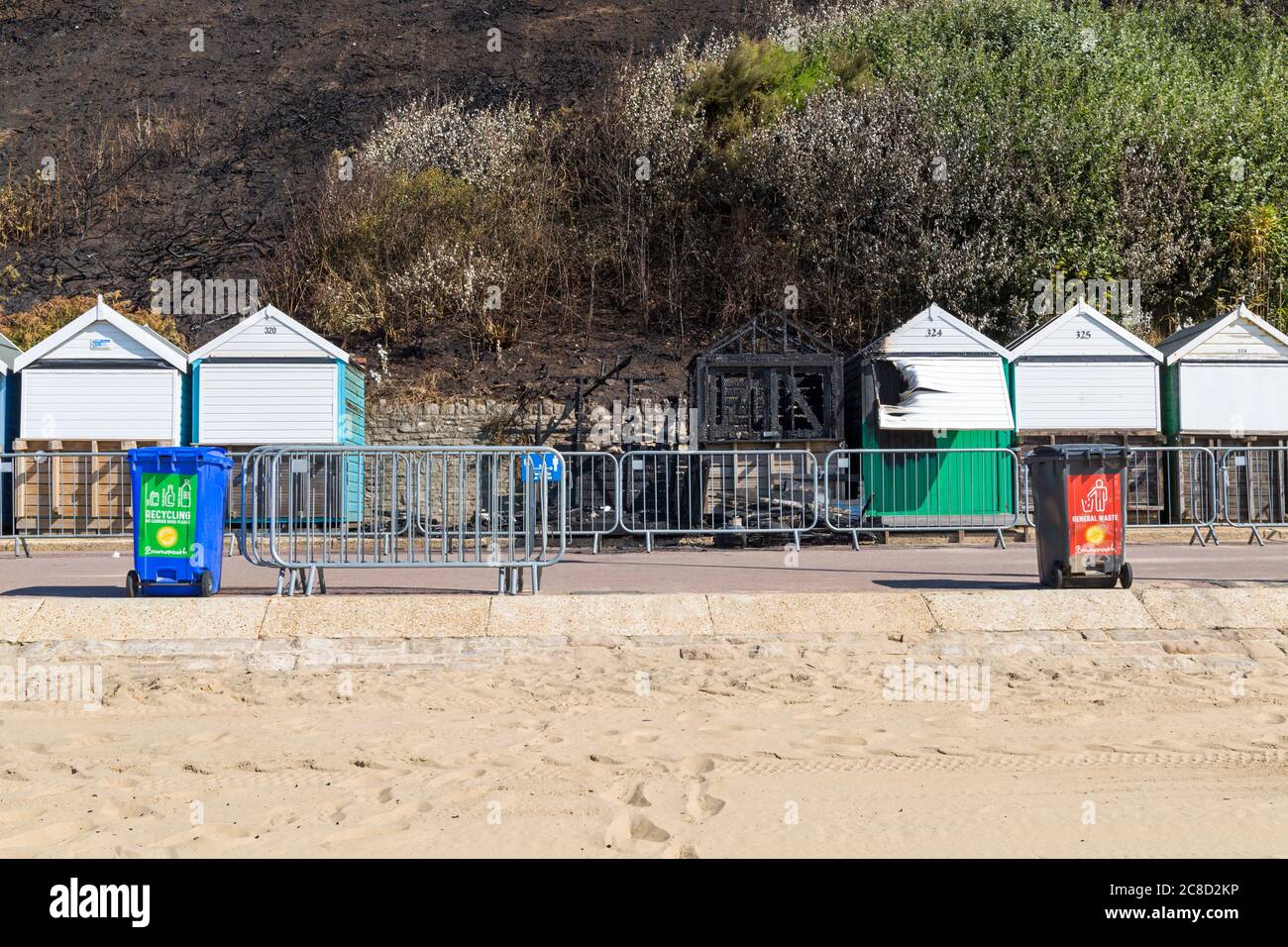 Charred remains of beach huts destroyed in fire at West Cliff beach ...
