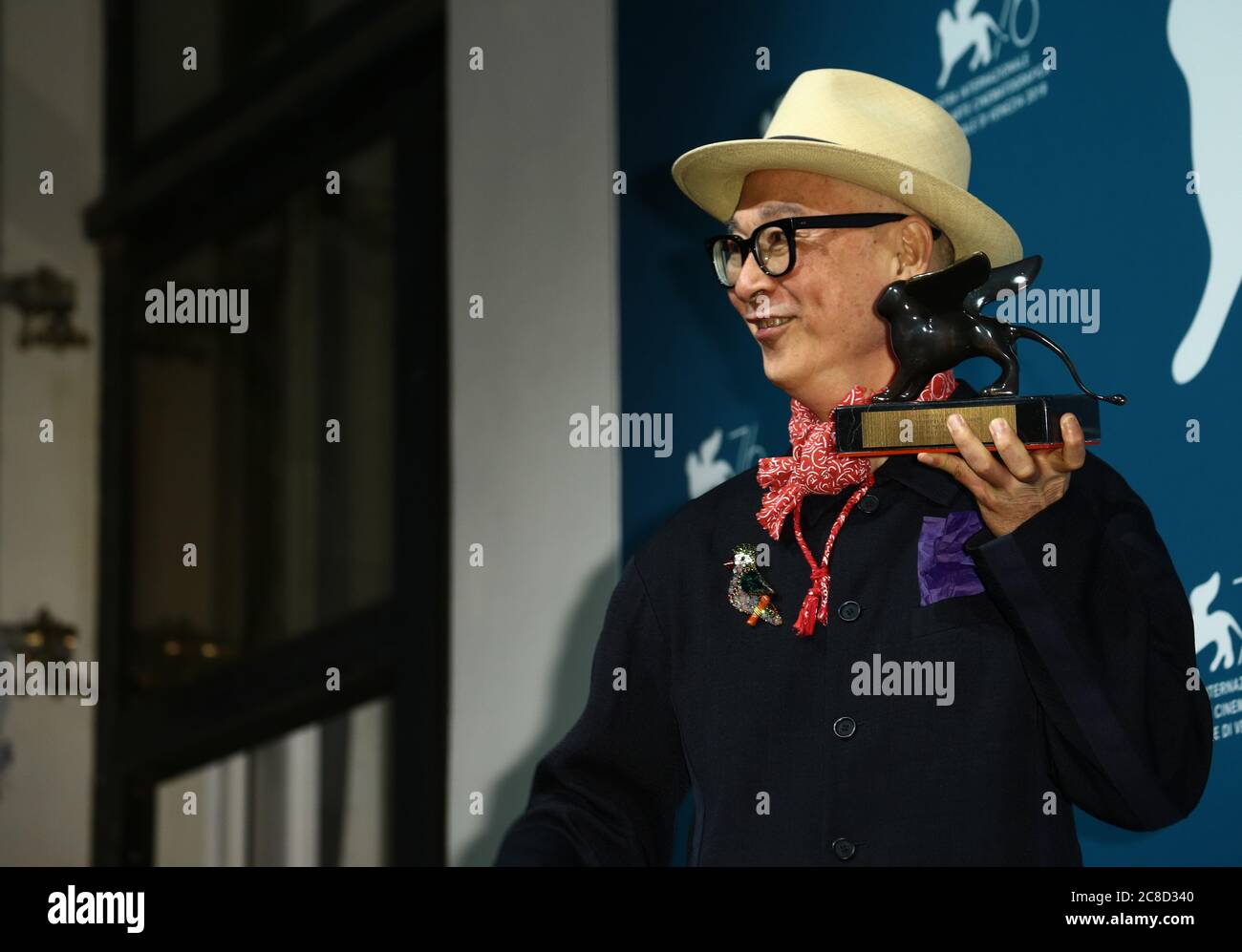 VENICE, ITALY - SEPTEMBER 07: Yonfan poses with the Award for Best ...