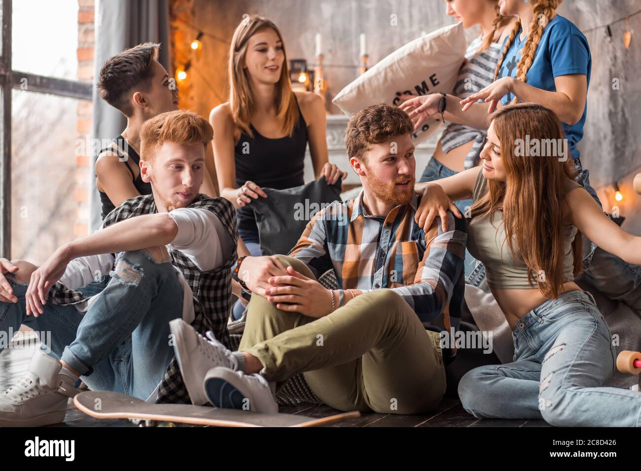 friends talking indoor Stock Photo - Alamy