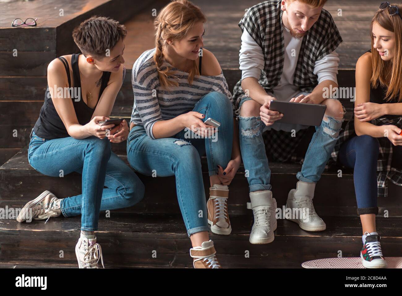 Group of young beautiful multiethnic woman and man friends leaning ...